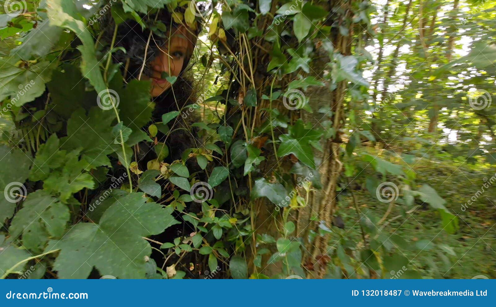 Woman Hiding In The Bushes