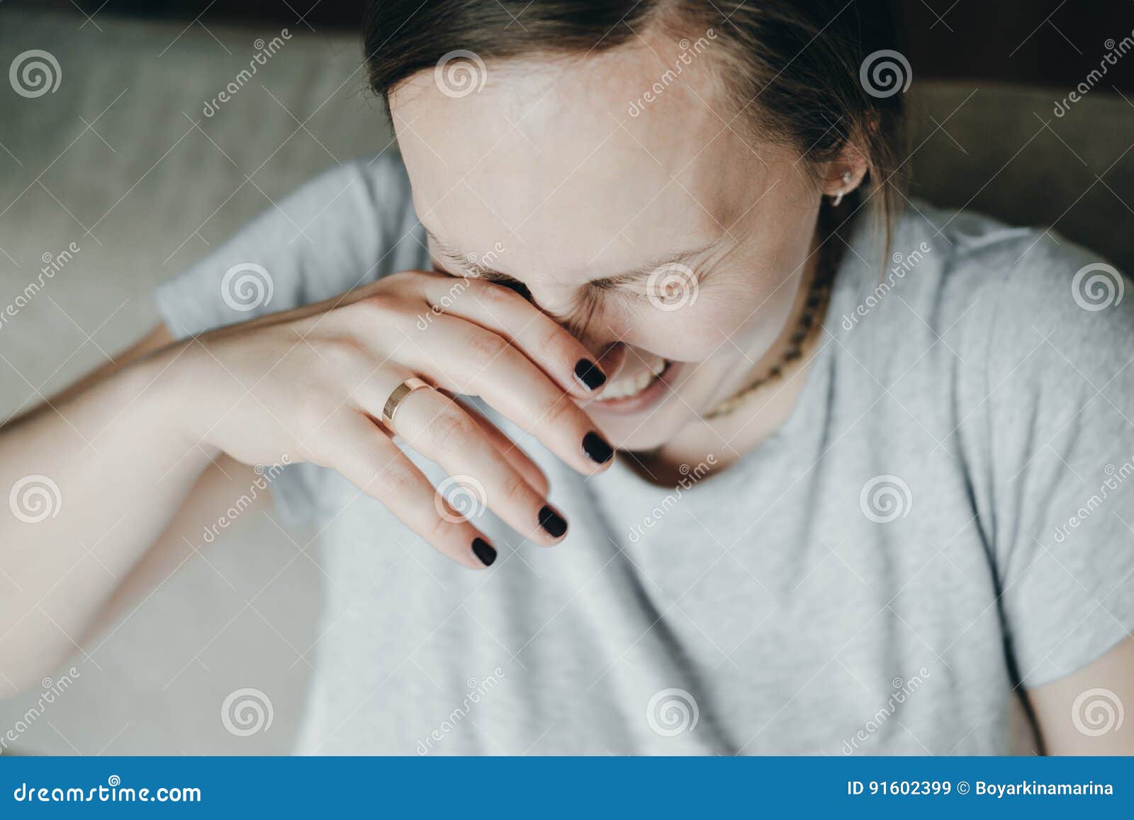 Woman Hiding Face Laughing through Hands. Stock Image - Image of ...