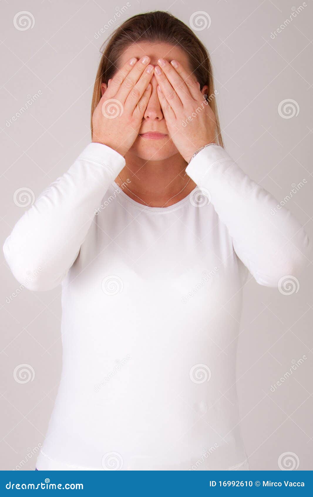 Woman hiding her eyes stock photo. Image of hands, young - 16992610