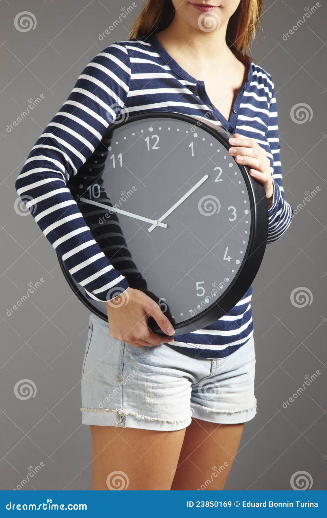 Woman holding big clock stock image. Image of business - 23850169