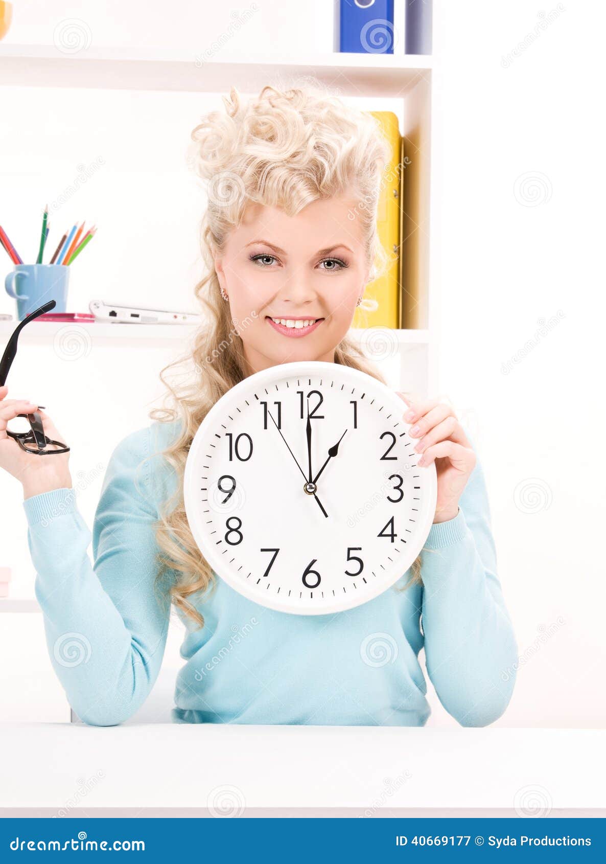 Woman holding big clock stock image. Image of office - 40669177