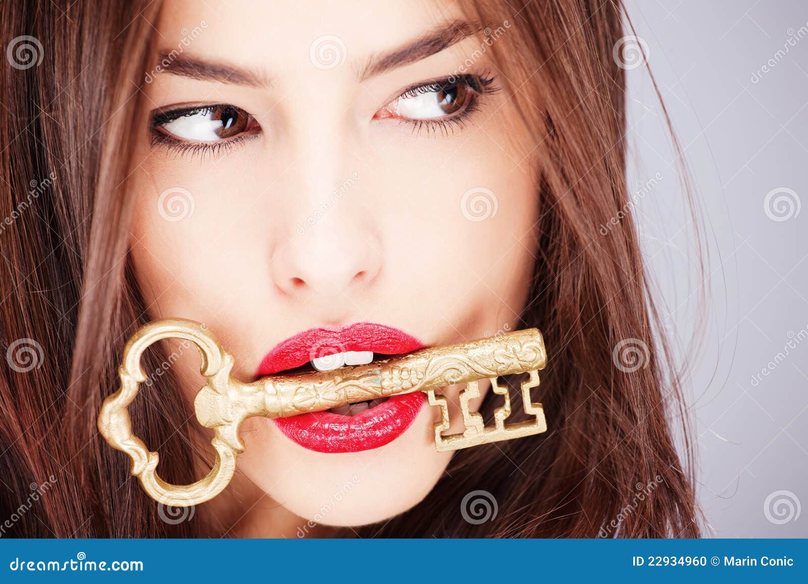 Woman holding big old key stock photo. Image of hand - 22934960