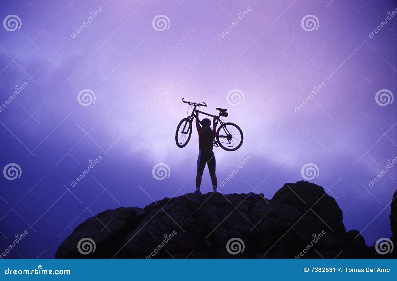 Woman Holding Bike Overhead Stock Image - Image of blue, mountaintop ...