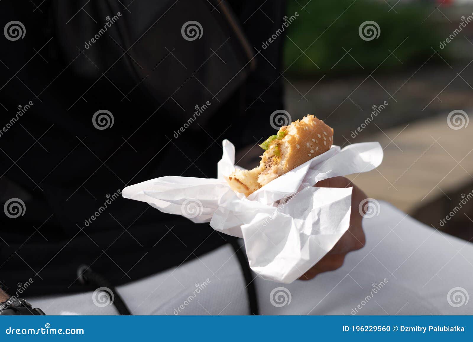 Woman is Holding a Bitten Burger Stock Photo - Image of meal, people ...