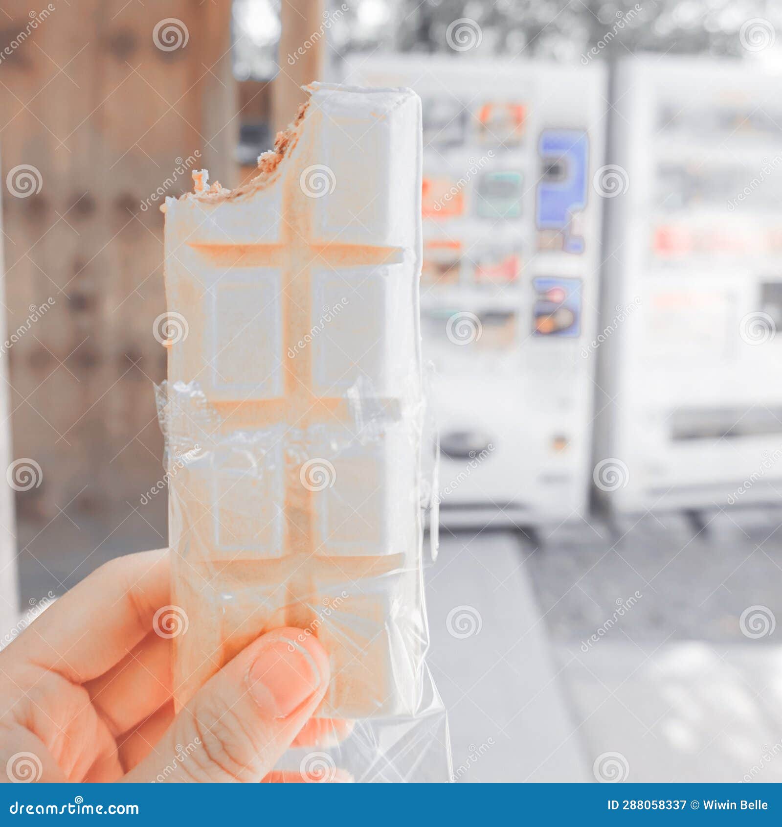 A Woman Holding a Bitten Waffle Ice Cream in White Filter Stock Image ...
