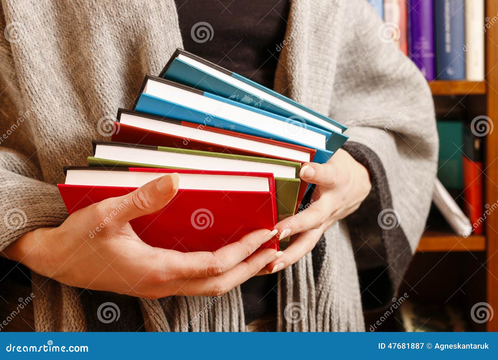 Woman holding books stock image. Image of library, notebook - 47681887