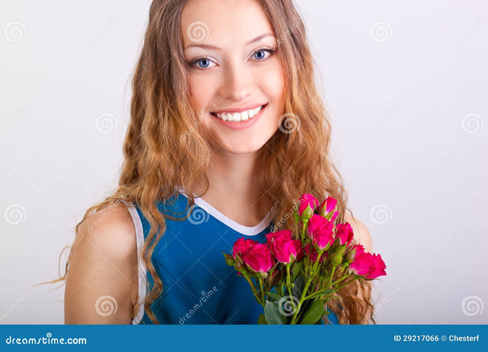 Woman Holding Bouquet of Roses Stock Photo - Image of hair, dress: 29217066