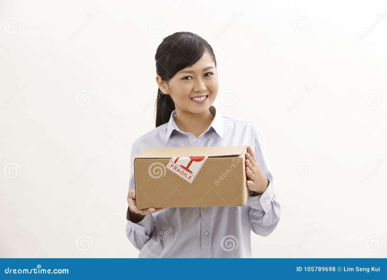 Woman holding a box stock photo. Image of white, delivery - 105789698