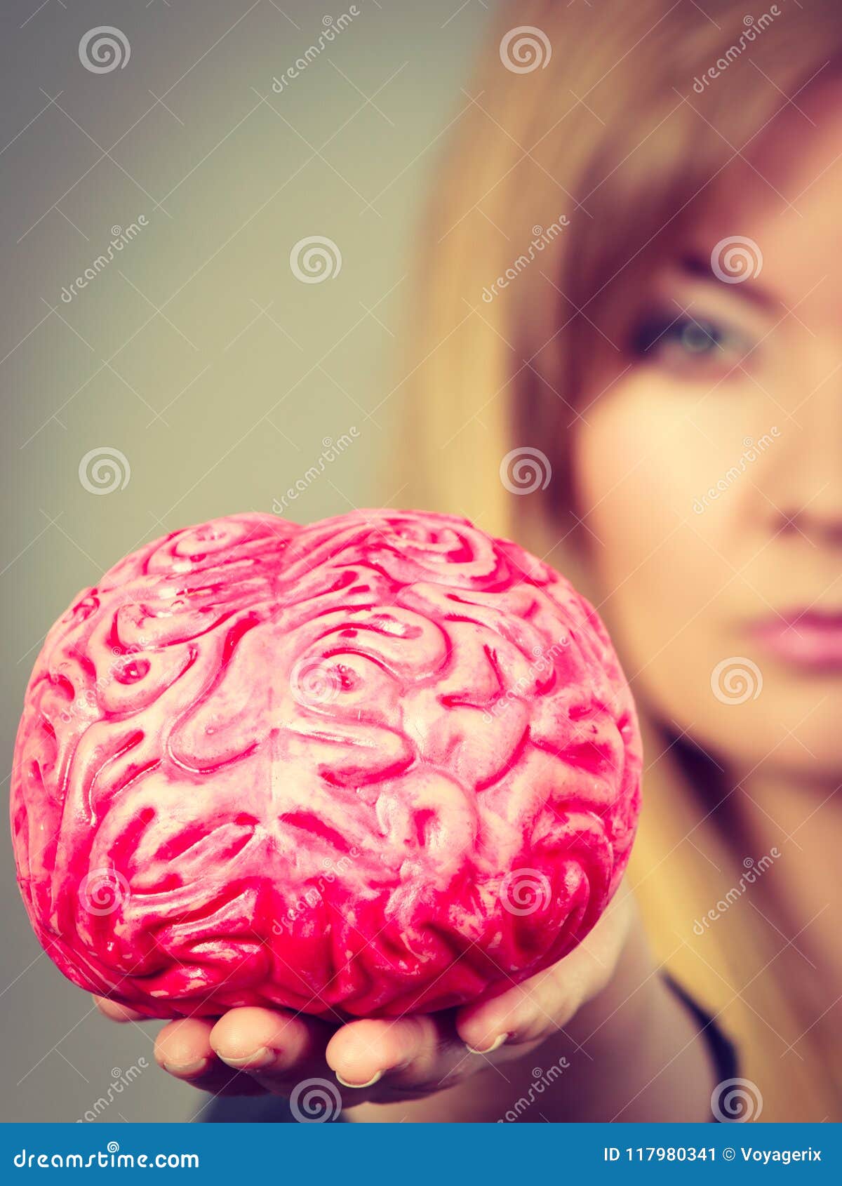 Woman Holding Brain Having Idea Stock Image - Image of wondering ...