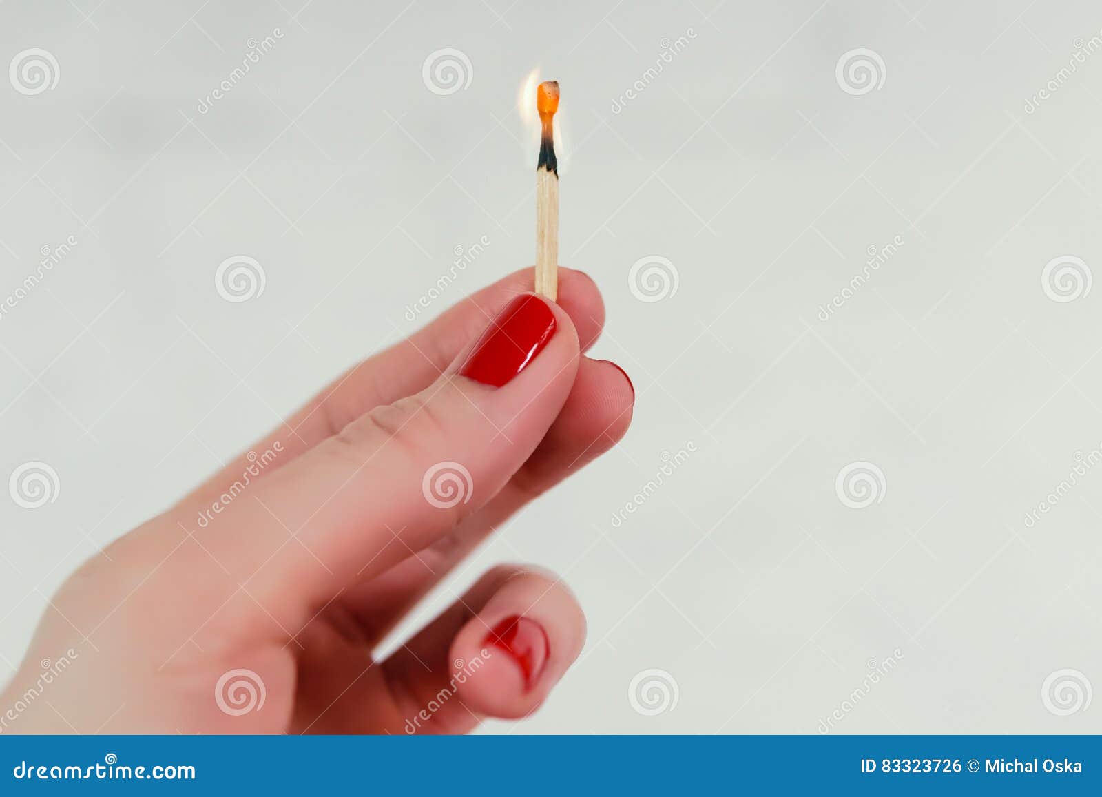 Woman Holding a Burning Match Stock Photo - Image of female, fire: 83323726