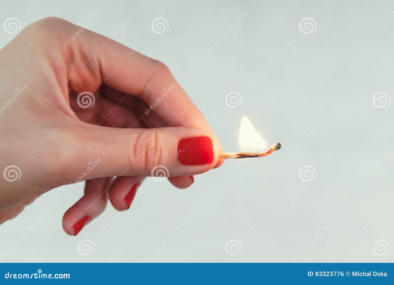 Woman Holding a Burning Match Stock Photo - Image of danger, glow: 83323776