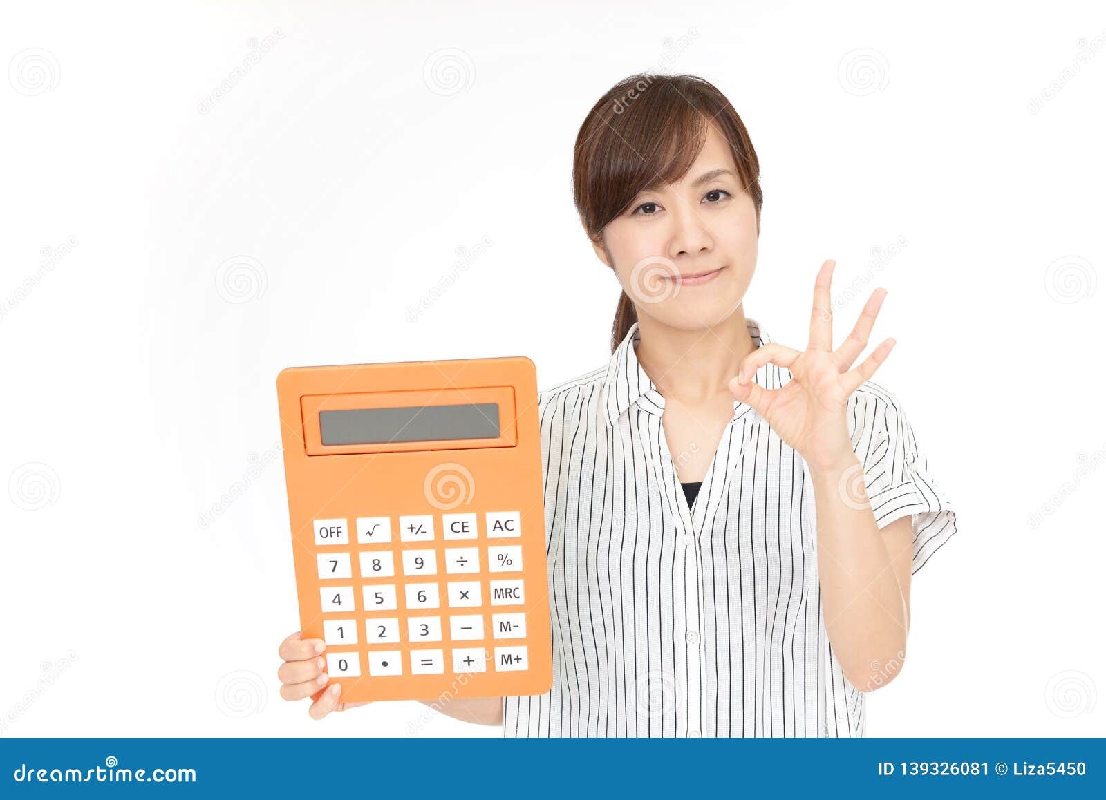 Woman holding a calculator stock image. Image of health - 139326081