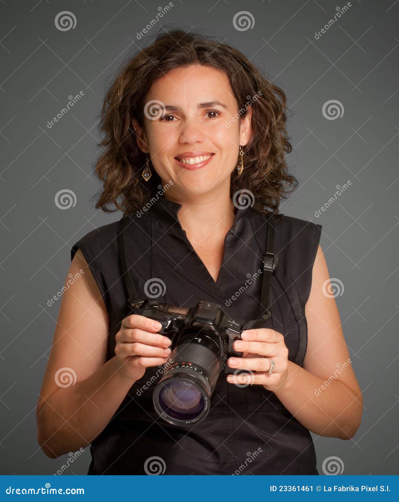 Woman holding a camera stock image. Image of natural - 23361461