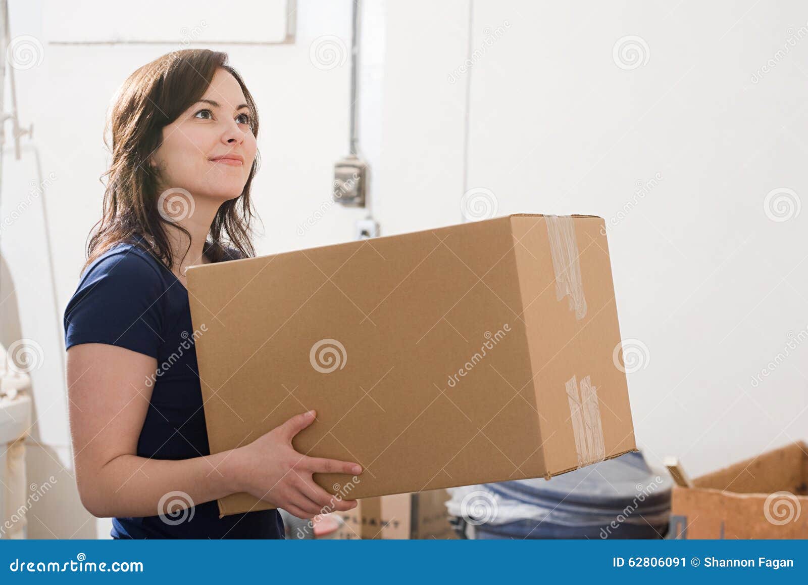 Woman Holding a Cardboard Box Stock Image - Image of horizontal, brown ...