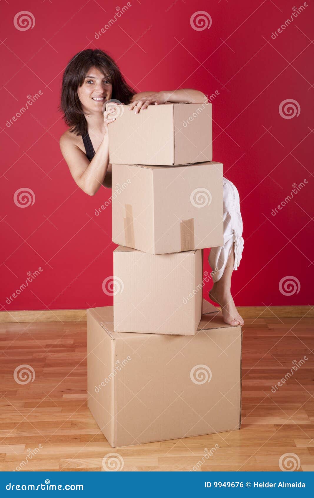 Woman Holding Cardboard Boxes Stock Photo - Image of floor, parket: 9949676