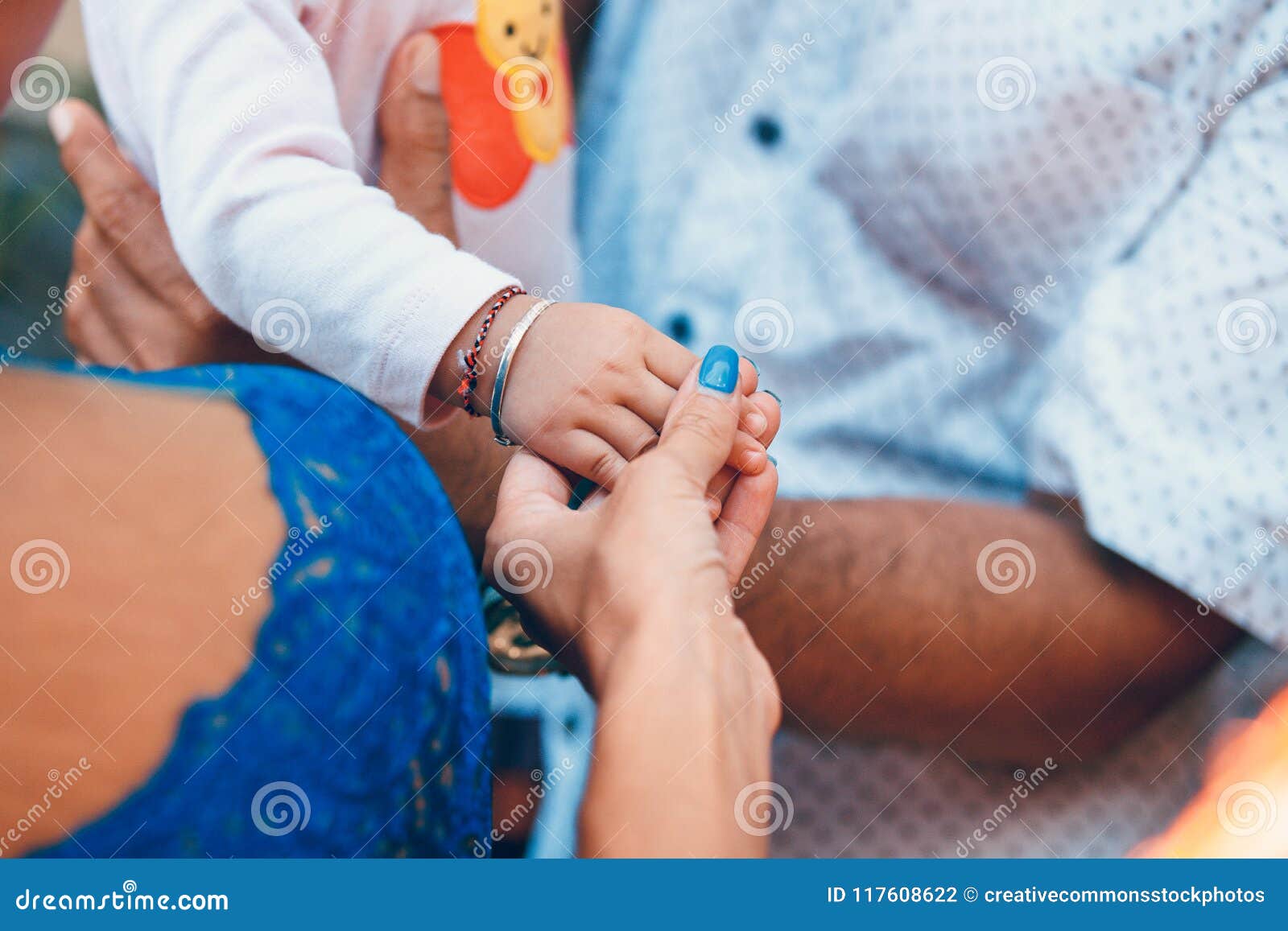 Woman Holding Child Hand Picture. Image: 117608622