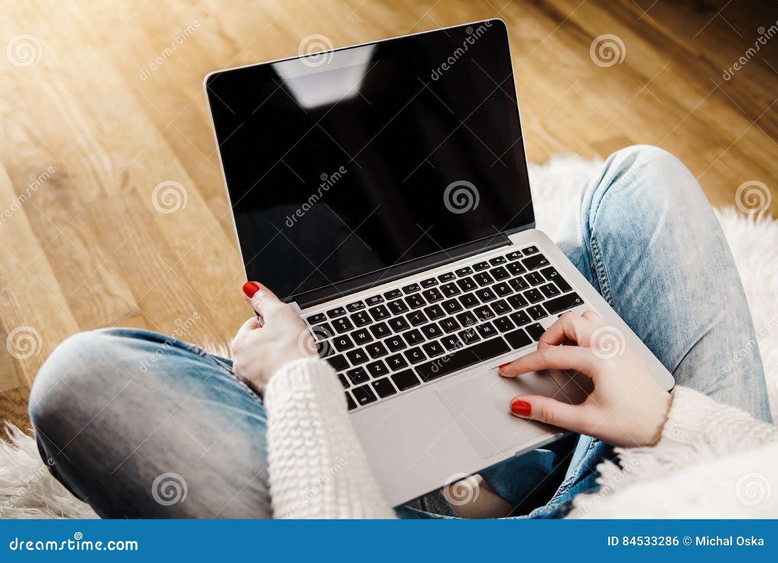 Woman Holding a Computer on Her Lap Stock Photo - Image of adult ...