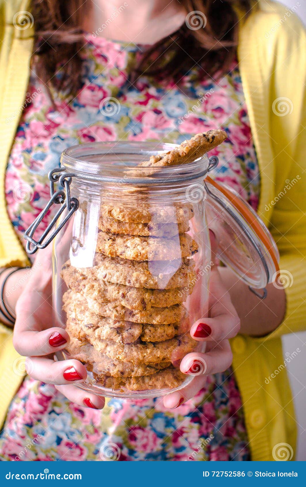 Woman Holding Cookie Jar with Cookies Stock Photo - Image of unhealthy ...