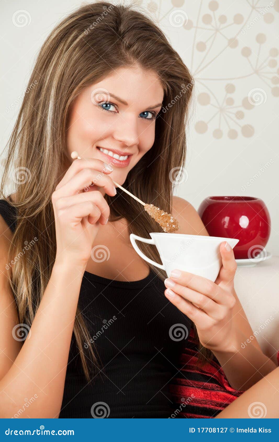Woman holding a cup of tea stock image. Image of cheerful - 17708127