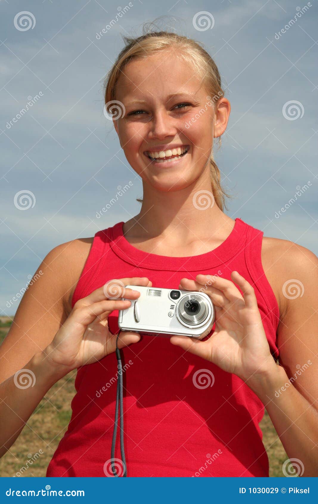 Woman Holding Digital Camera Stock Image - Image of summertime, woman ...