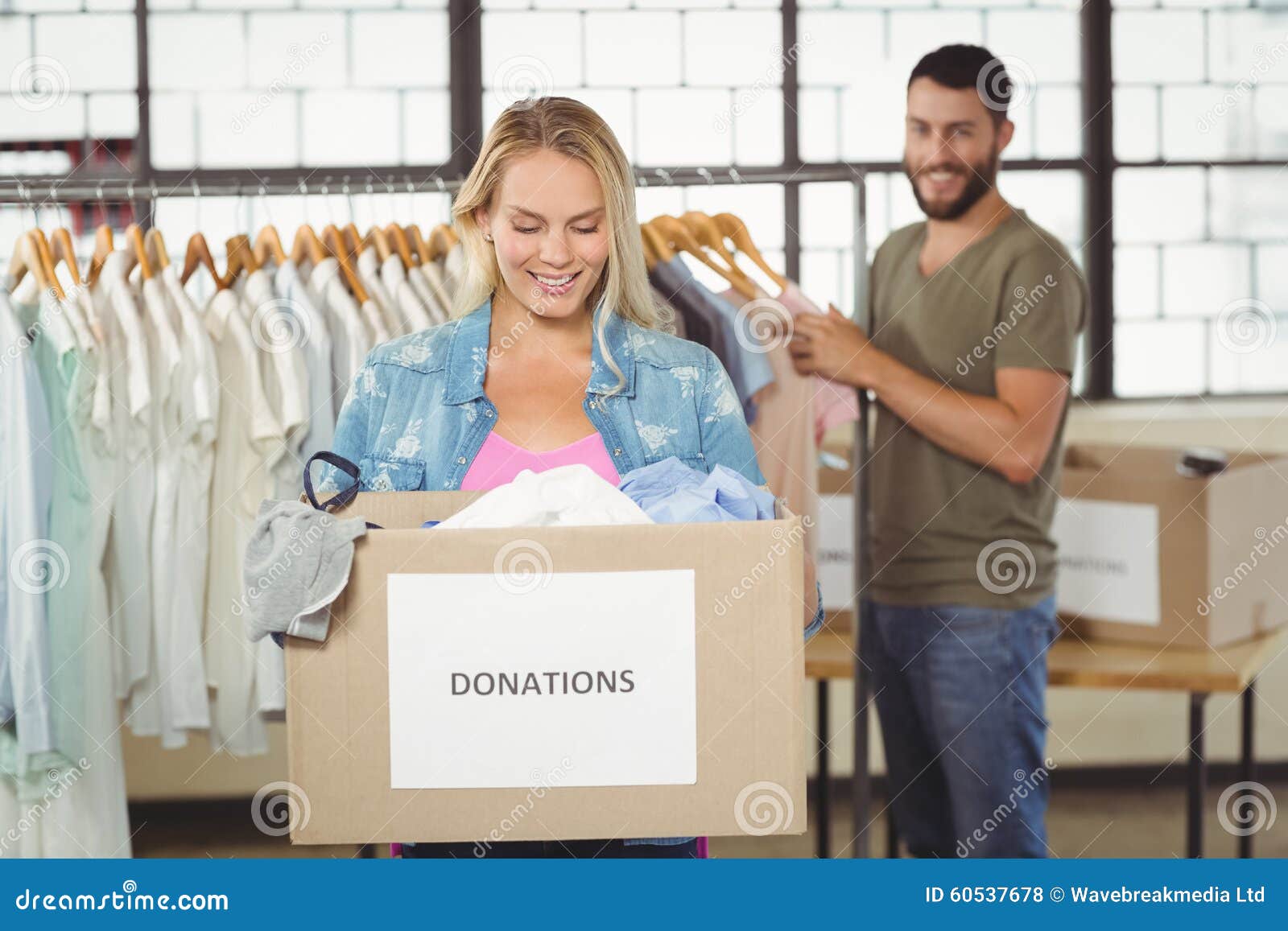 Woman Holding Donation Box in Creative Office Stock Photo - Image of ...