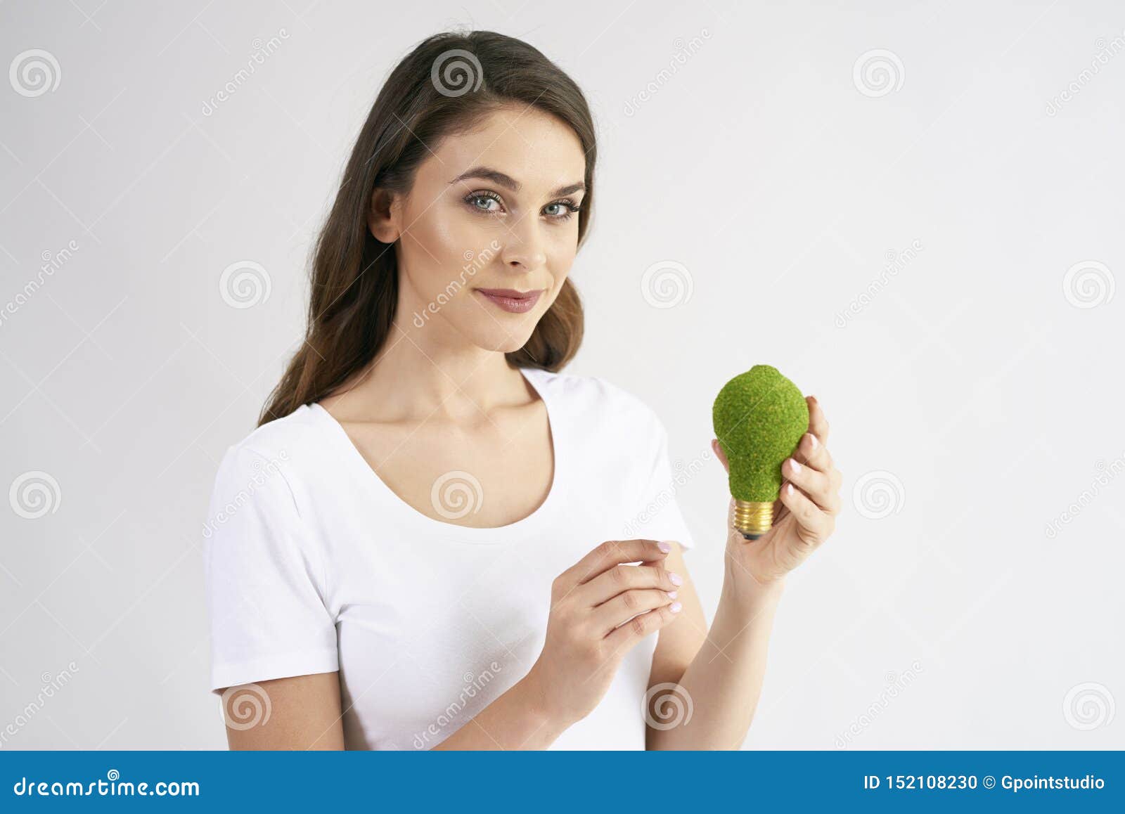 Woman Holding a Energy Efficient Light Bulb Stock Photo - Image of copy ...