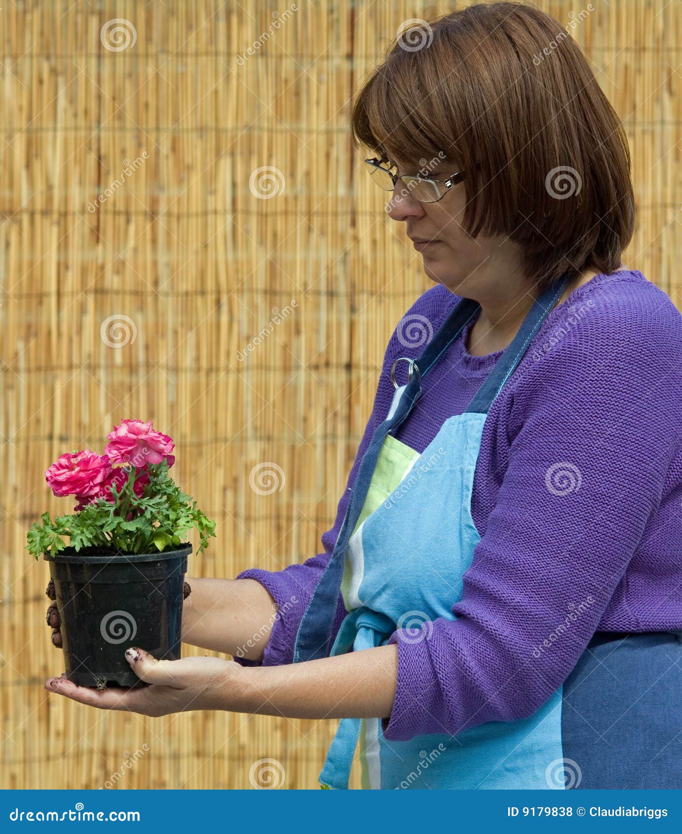 Woman Holding Flower Pot stock photo. Image of garden - 9179838