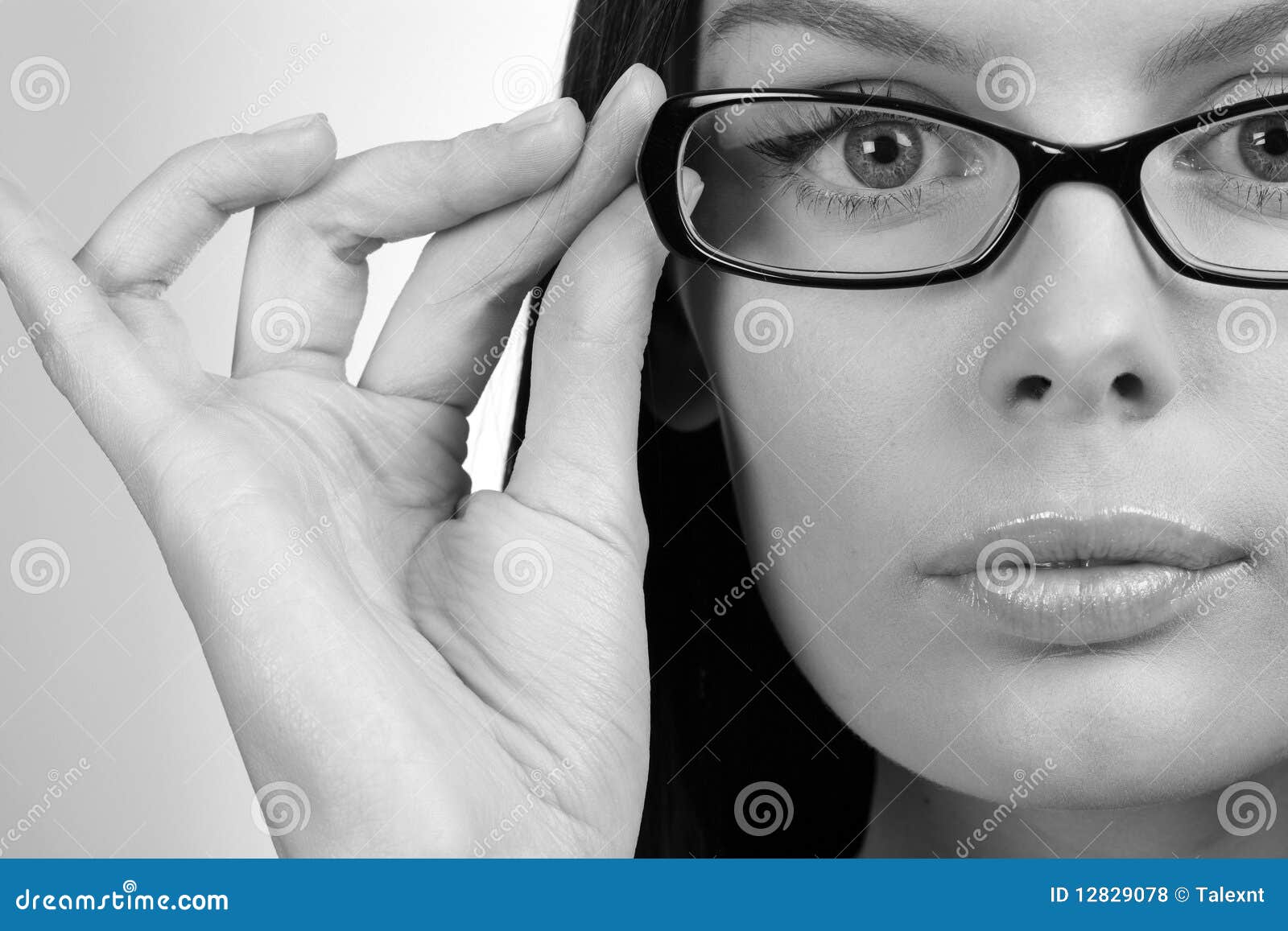 Woman holding glasses. stock photo. Image of brunette - 12829078