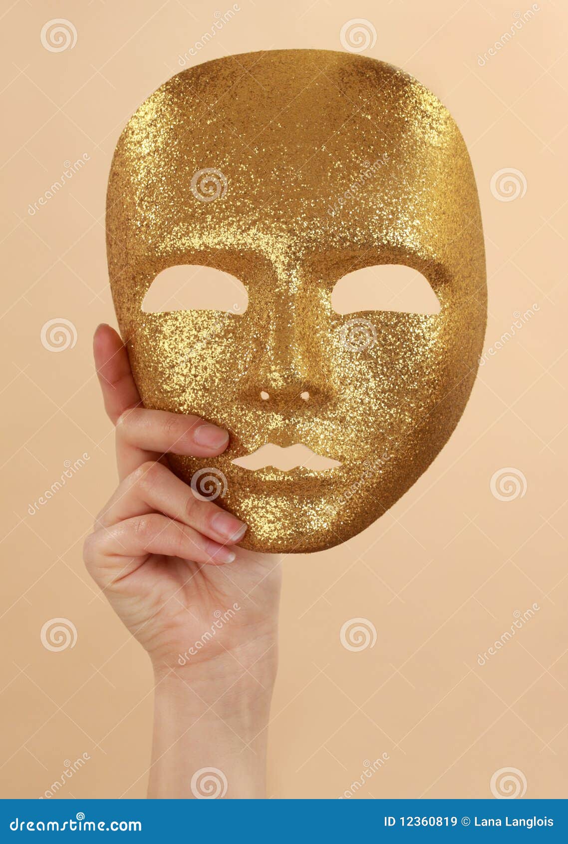 Woman holding gold mask stock image. Image of female - 12360819
