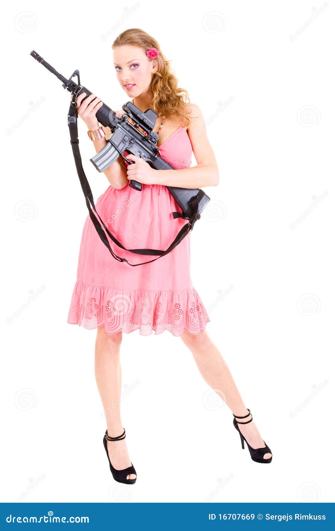 Woman holding a gun stock image. Image of glamour, pistol - 16707669