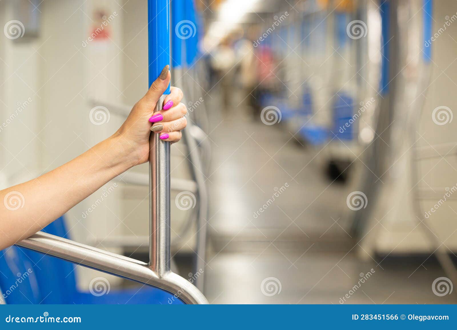 Woman Holding Hand on Handrail in Subway Car. Stock Photo - Image of ...