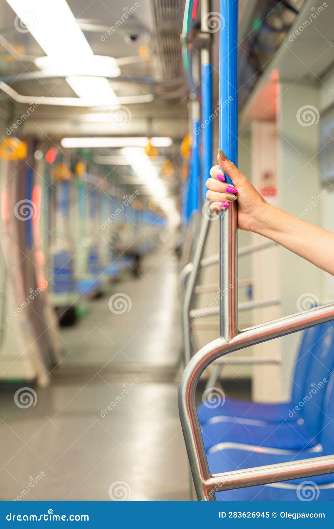 Woman Holding Hand on Vertical Handrail in Subway Car. Stock Image ...