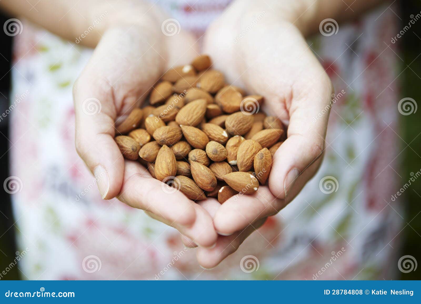 Woman Holding Handful of Almonds Stock Photo - Image of diet, aged ...