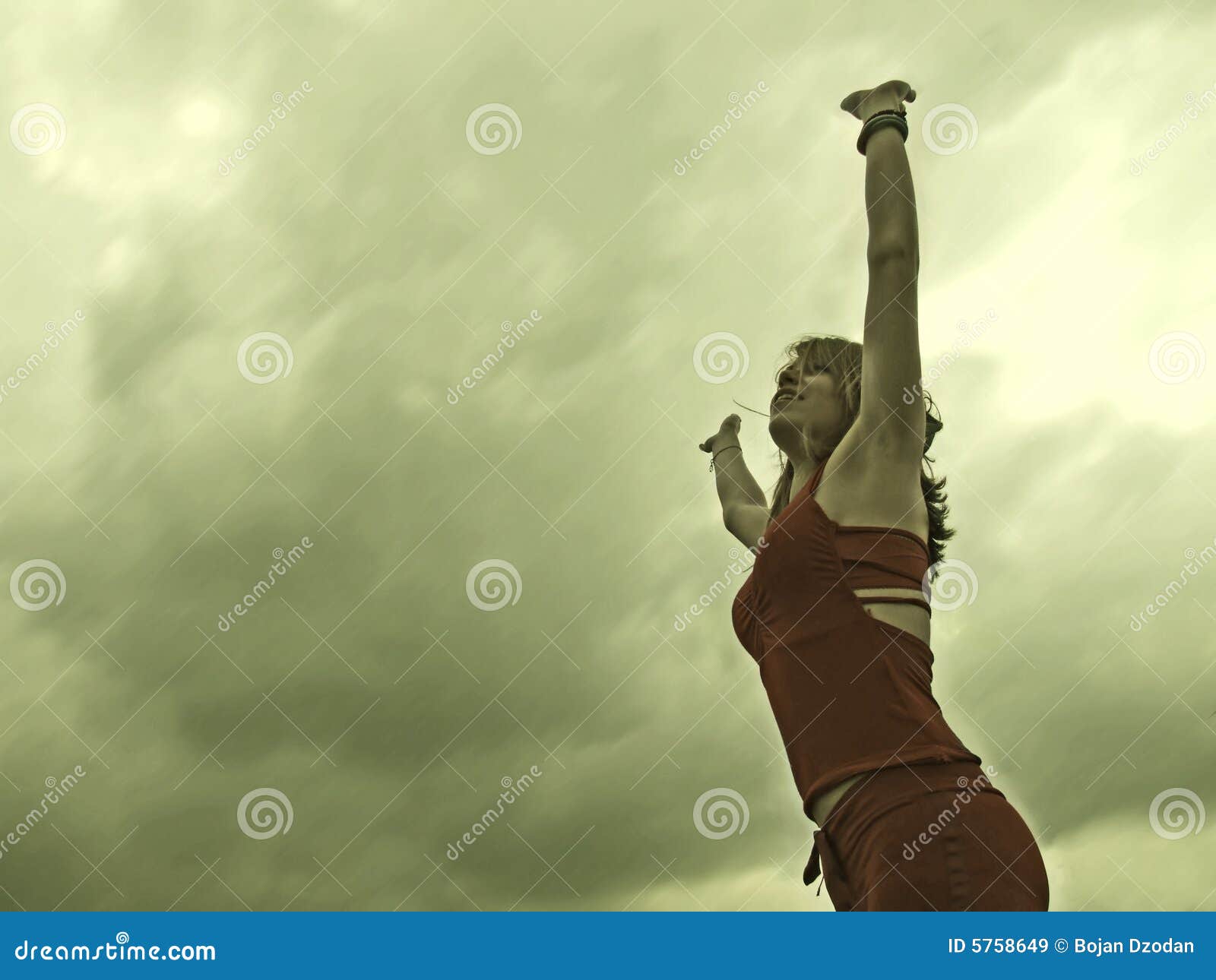 Girl Reaching Up To The Sky