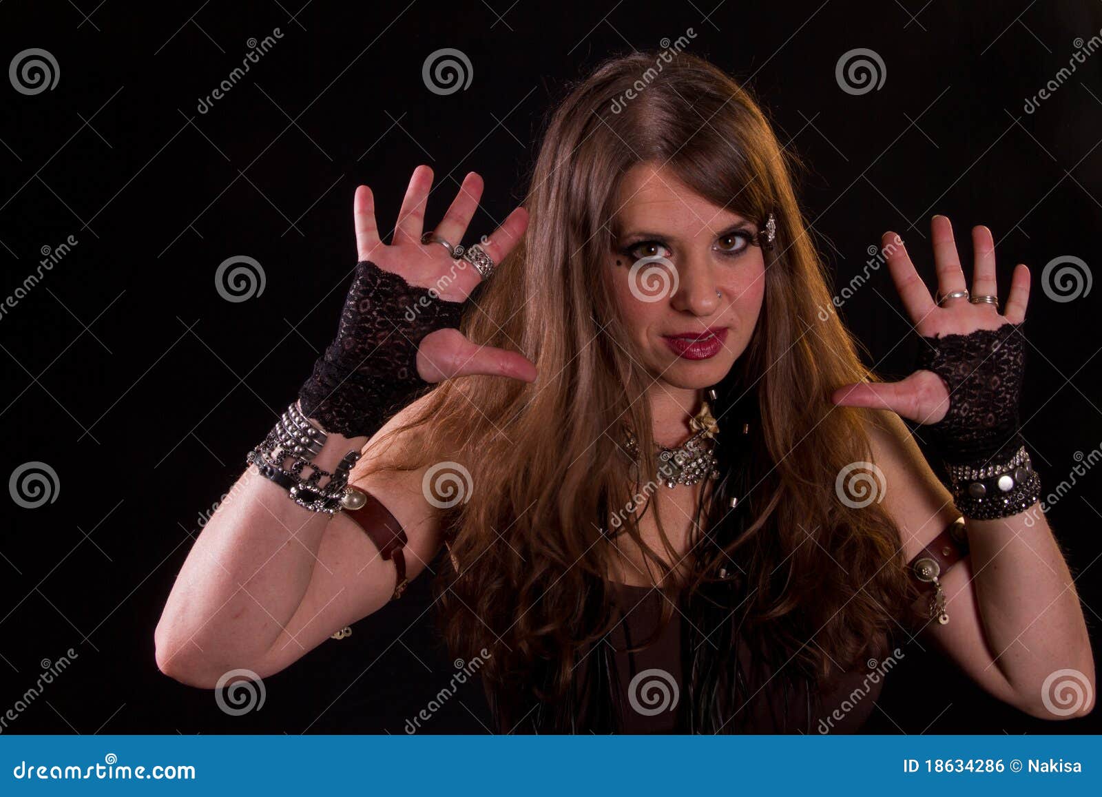 Woman holding her hands up stock photo. Image of black - 18634286