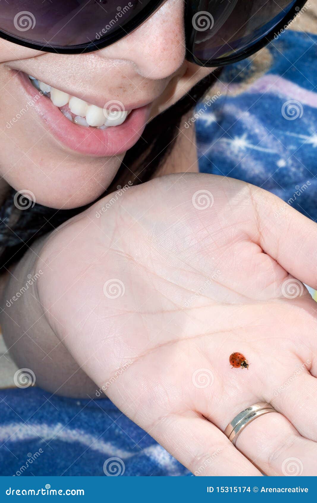 Woman Holding a Ladybug stock photo. Image of careful - 15315174