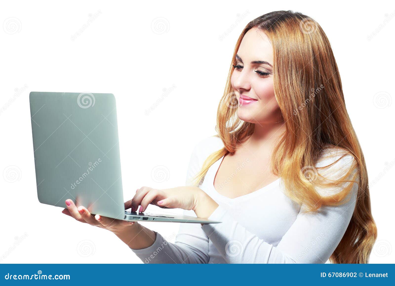 Woman holding a laptop stock photo. Image of charming - 67086902