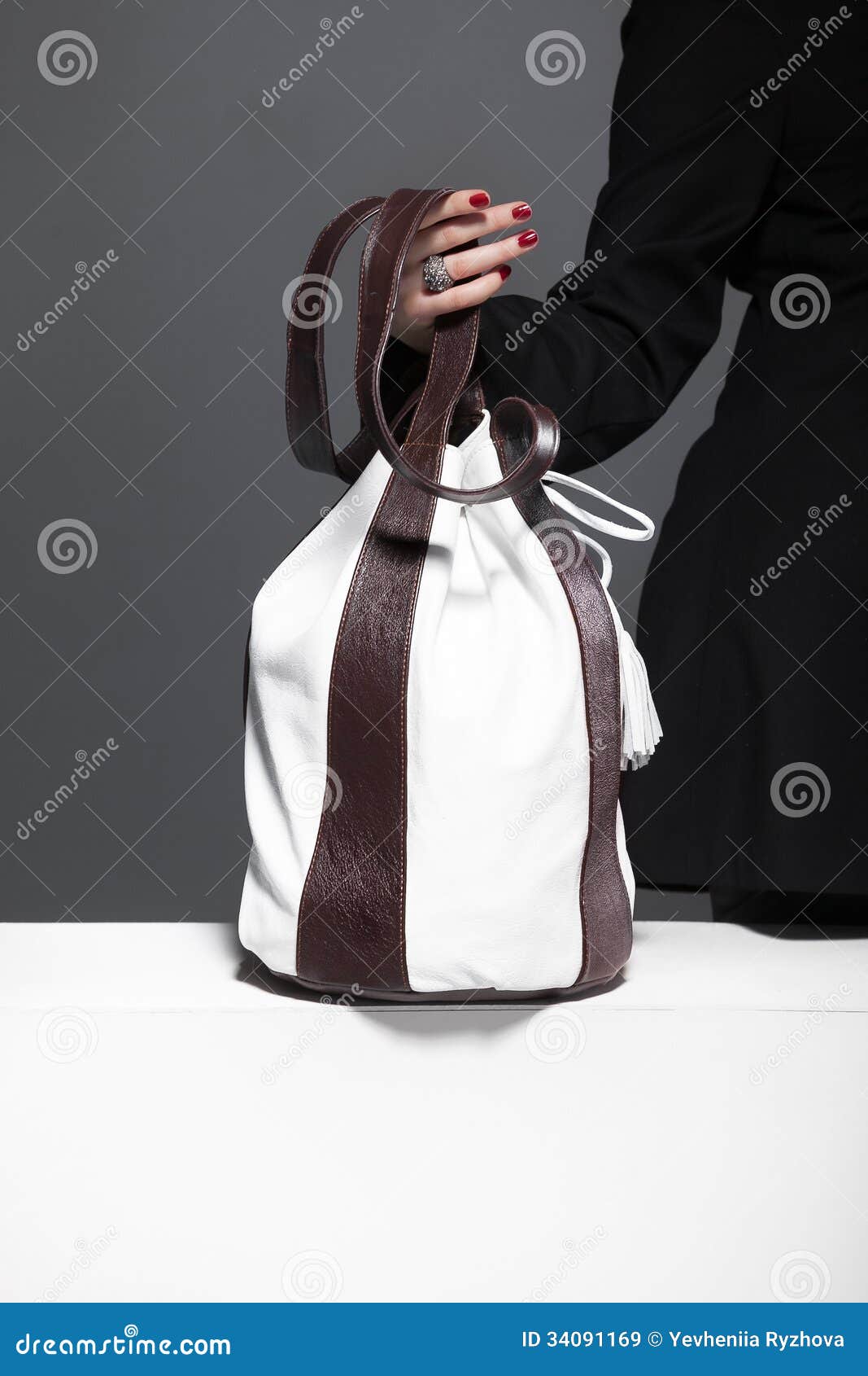 Woman Holding Leather Rucksac Stock Image - Image of hold, sack: 34091169
