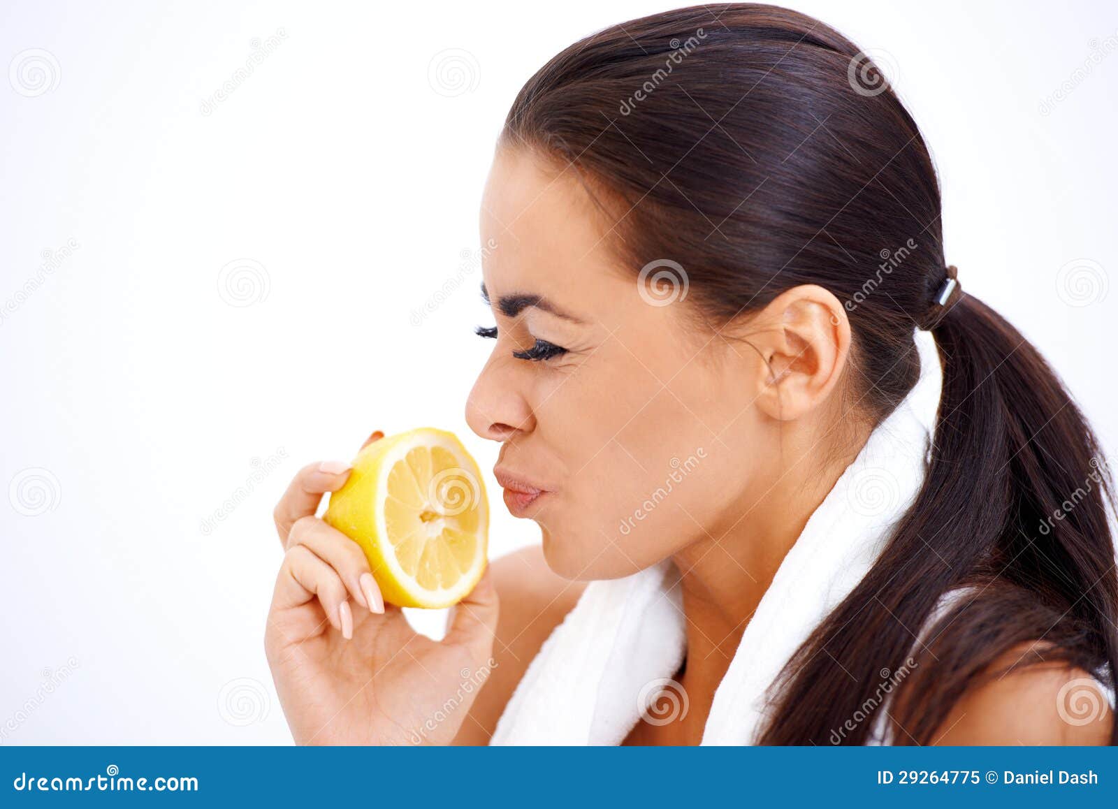 Woman Holding Lemon while Making a Face Stock Image - Image of person ...