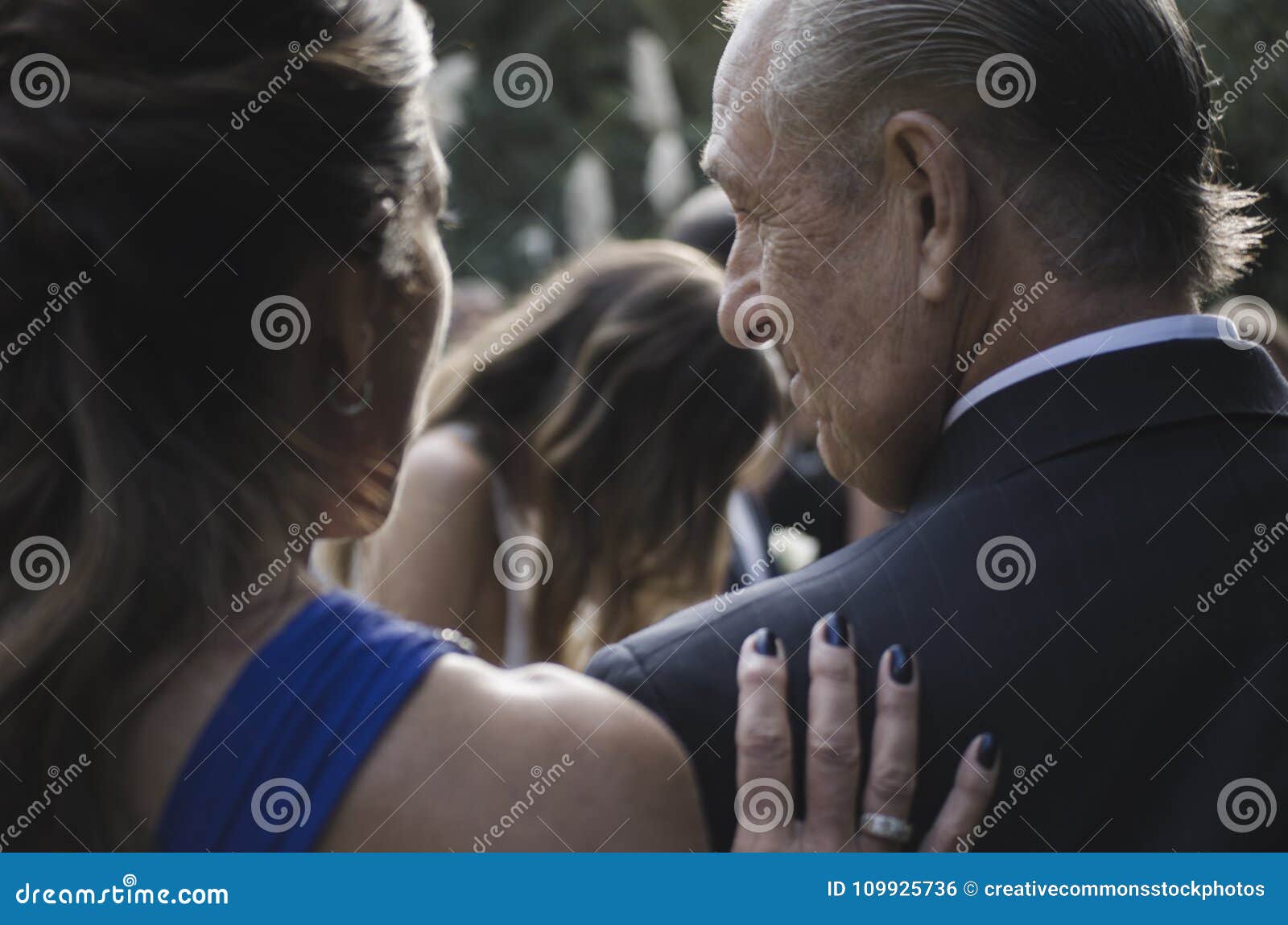 Woman Holding A Man On The Back Picture. Image: 109925736