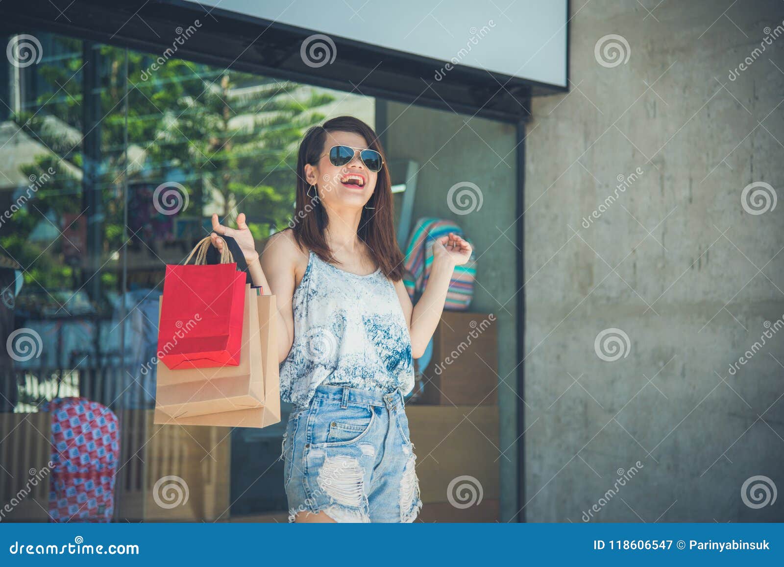 Woman Holding Many Shopping Bags and Smiles Stock Image - Image of bags ... Woman Holding Many Shopping Bags and Smiles Stock Image - Image of bags ...