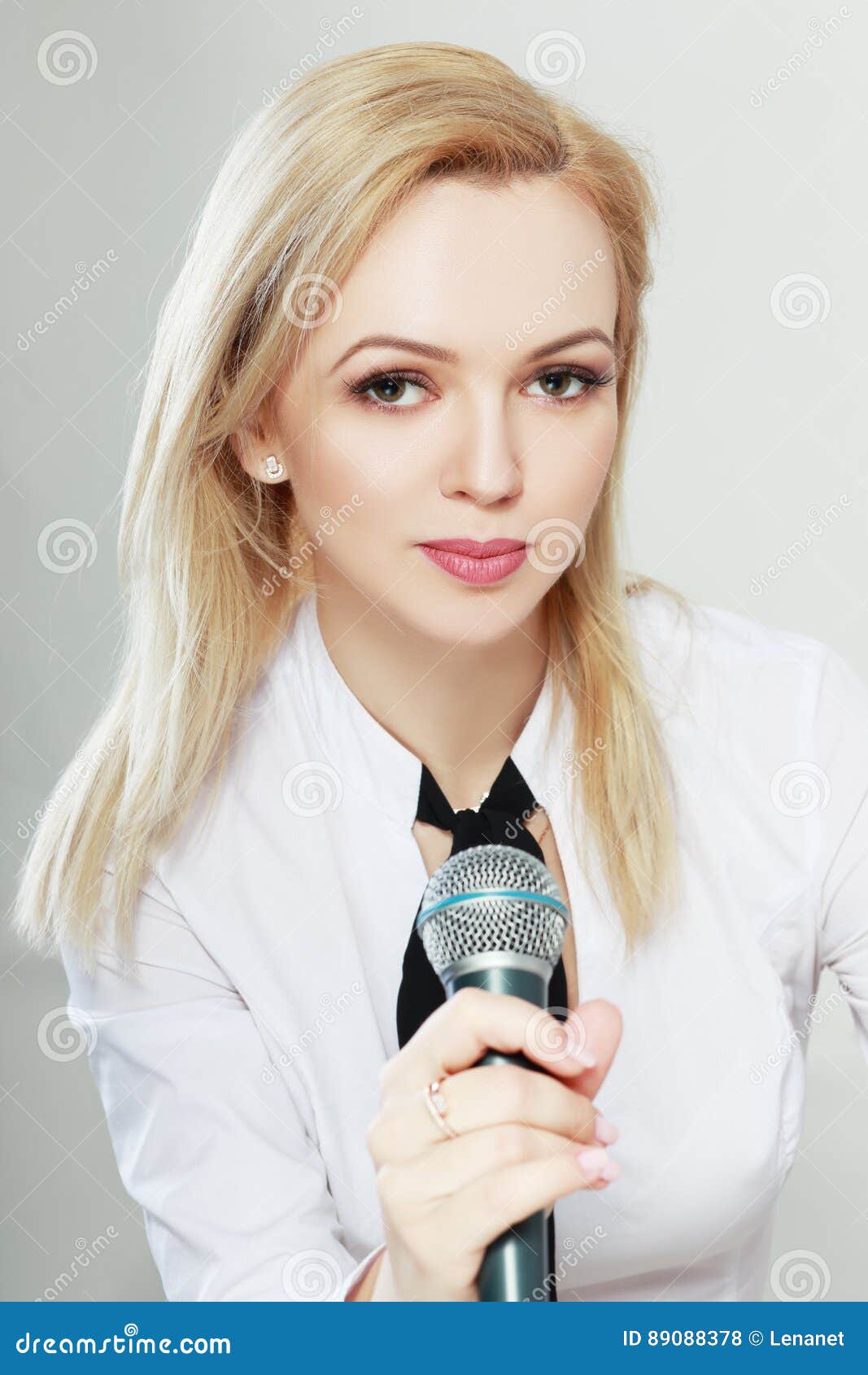 Woman holding microphone stock photo. Image of lady, presenter - 89088378