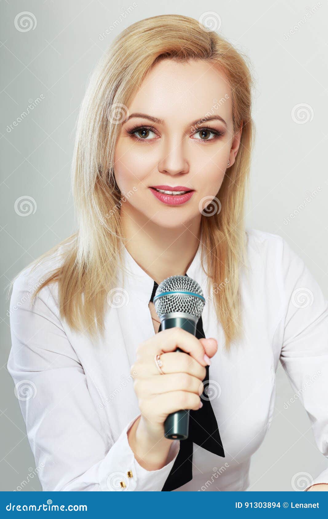 Woman holding microphone stock photo. Image of color - 91303894