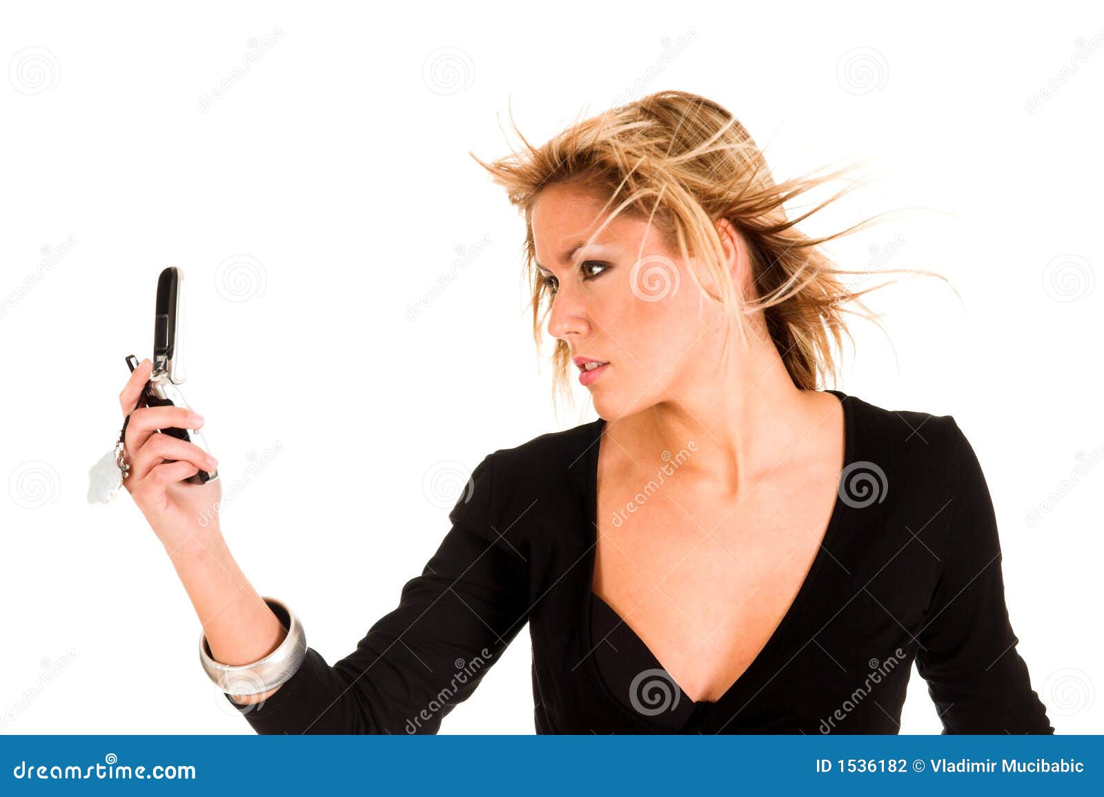 Woman holding mobile phone stock photo. Image of electronic - 1536182