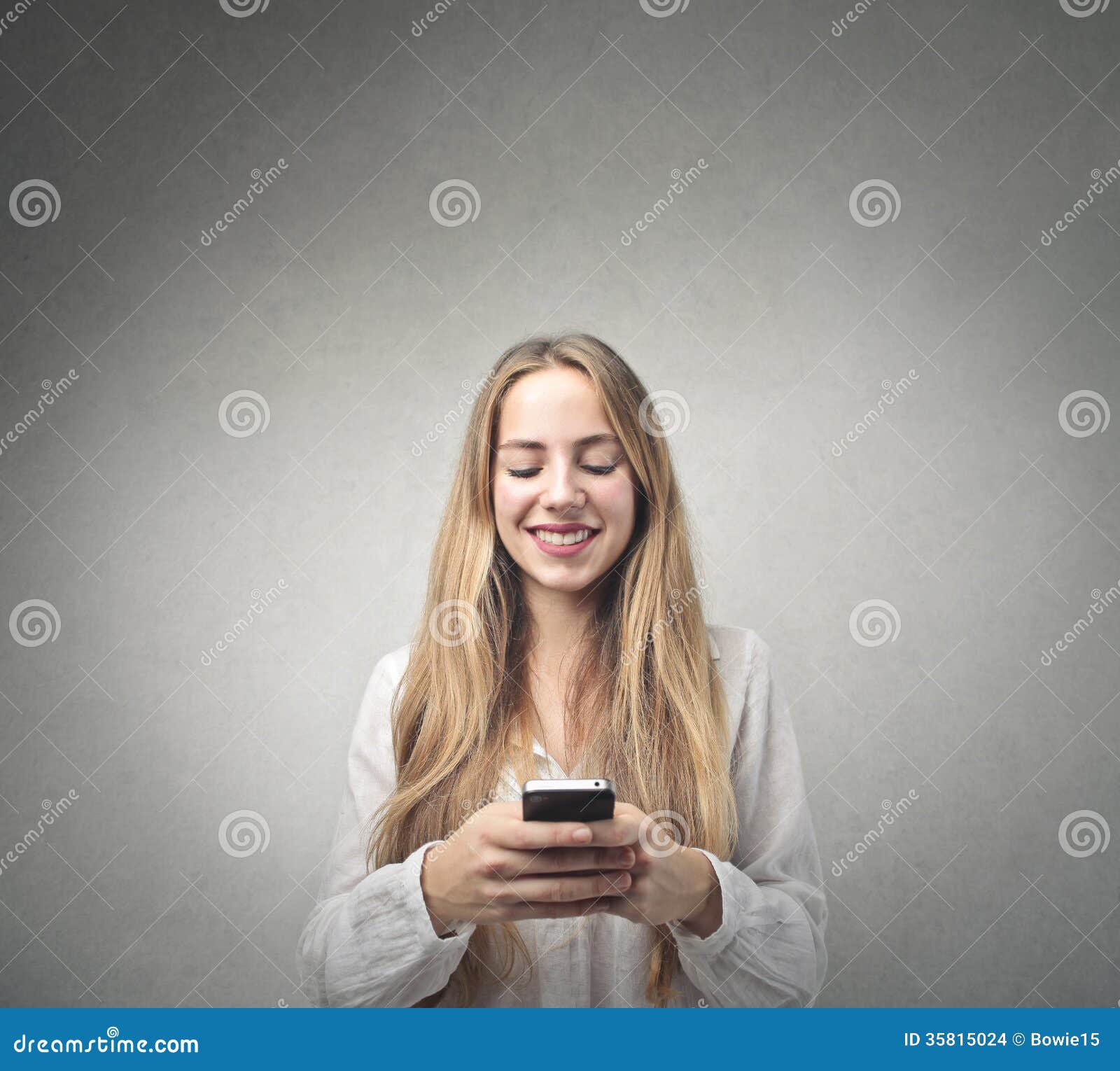 Woman Holding a Mobile Phone Stock Photo - Image of beautiful, youth ...