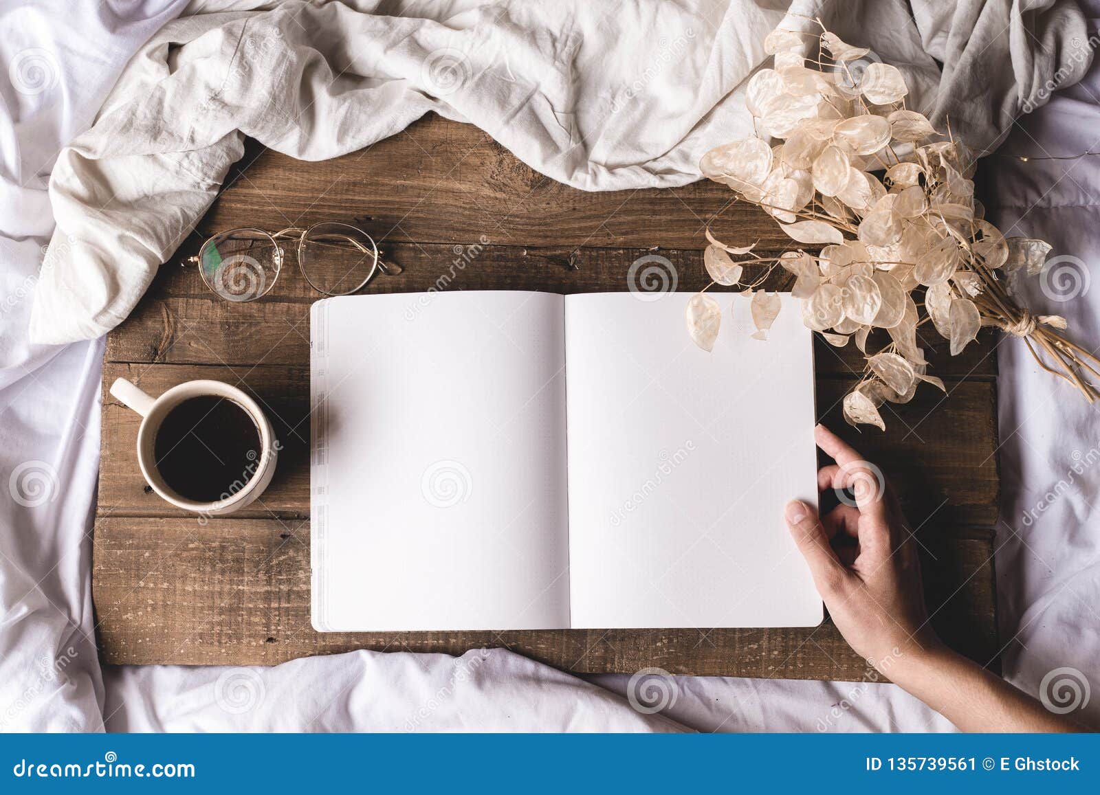 Woman Holding Notepad on a Table Stock Image - Image of notepad ...