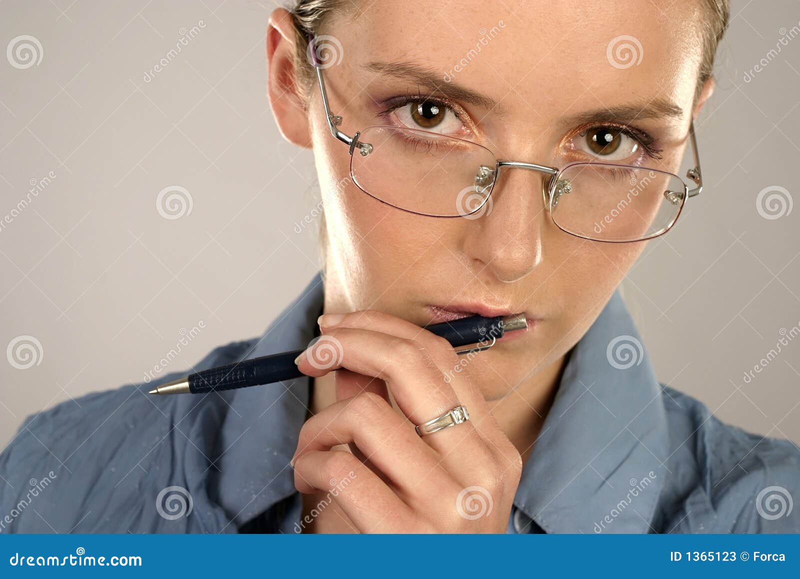 Woman holding a pen stock image. Image of form, business - 1365123