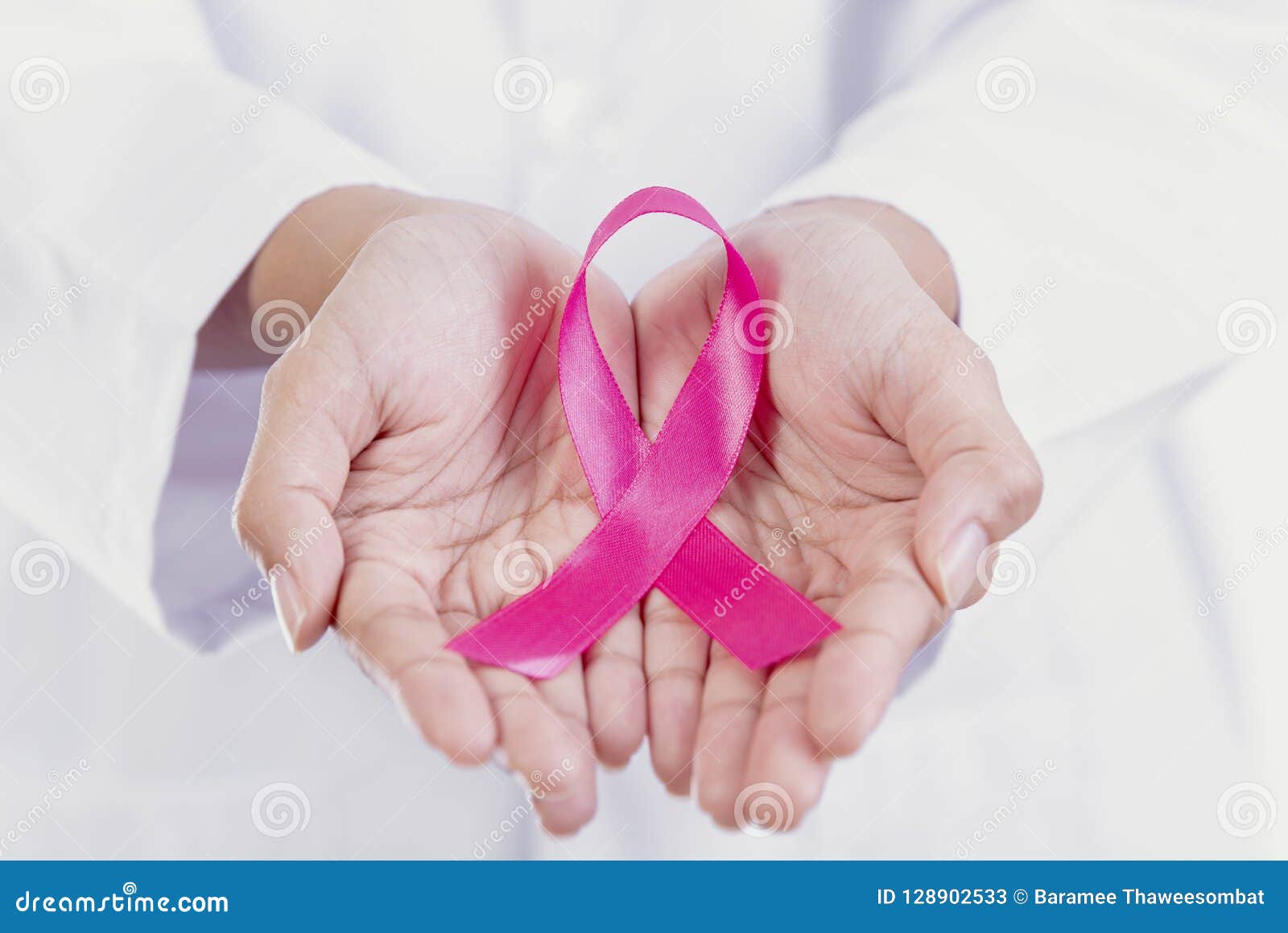 Woman Holding Pink Ribbon Symbol Of Breast Cancer Awareness Stock