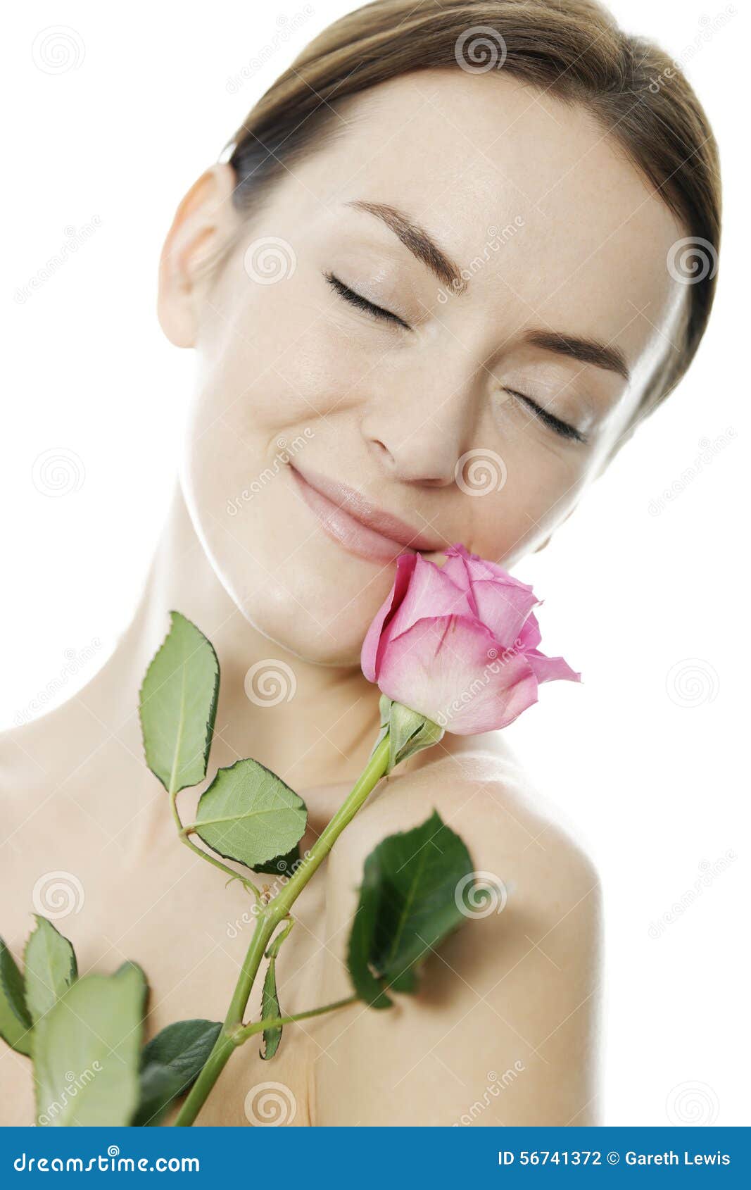 Woman holding a pink rose stock photo. Image of background - 56741372