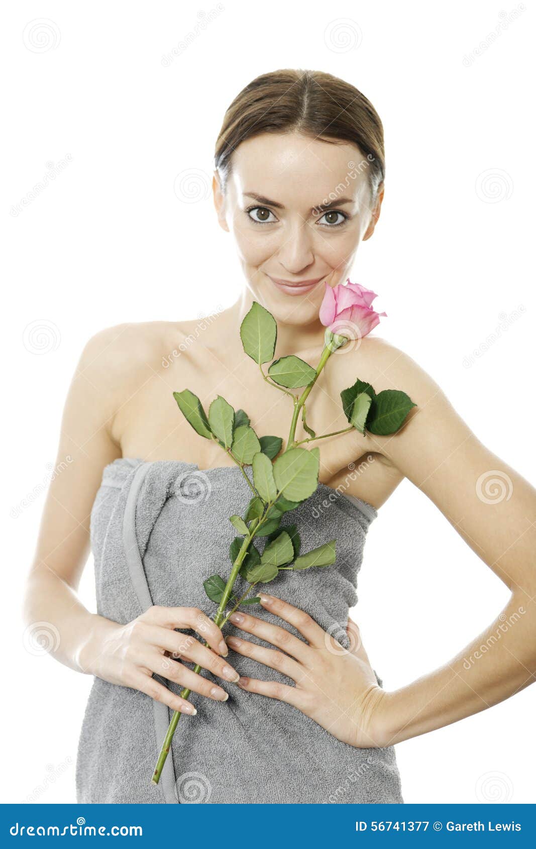 Woman holding a pink rose stock image. Image of female - 56741377